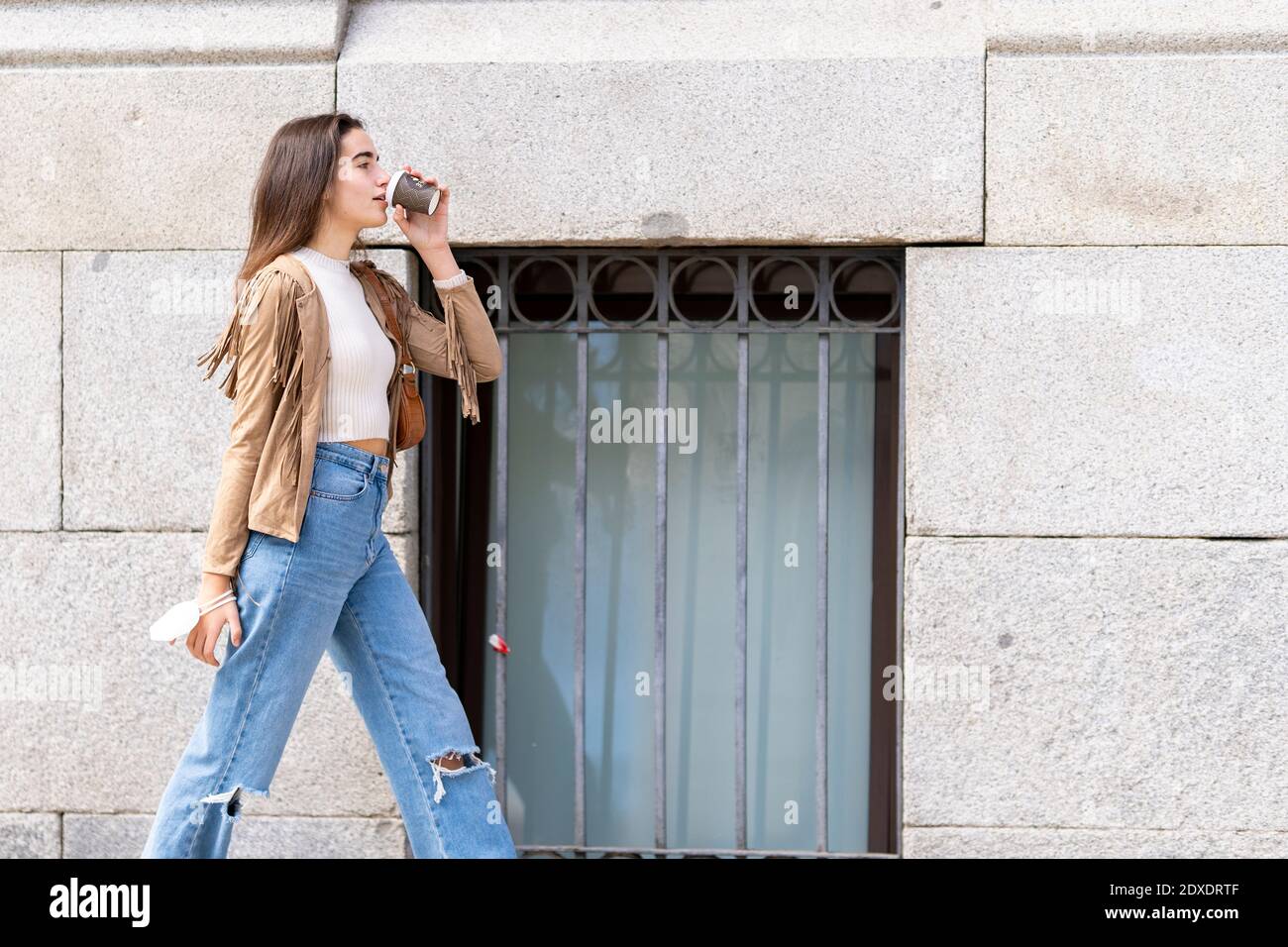 Drinking while walking hi-res stock photography and images - Alamy