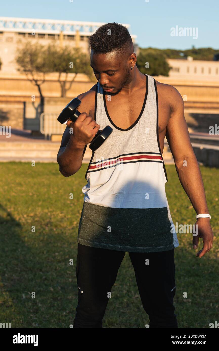 Exercise dumbbell standing hi-res stock photography and images - Alamy