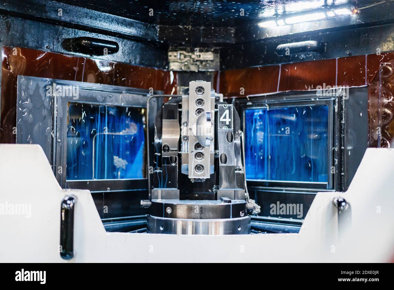 Automated machine plant in illuminated factory Stock Photo - Alamy