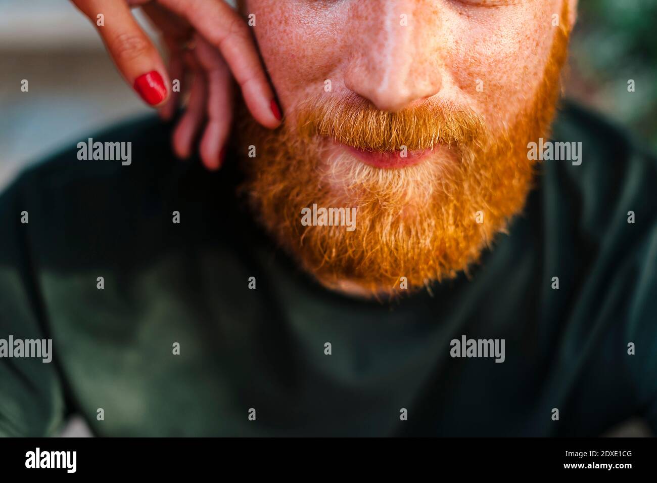 Woman Touching Boyfriend Face With Hand High Resolution Stock ...