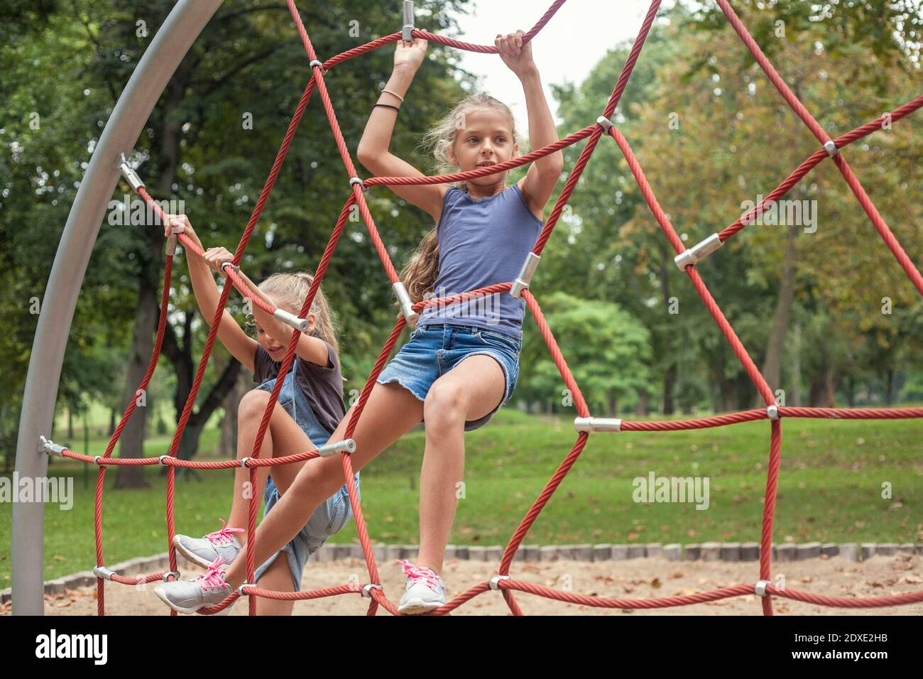 Girls climbing trees hi-res stock photography and images - Alamy