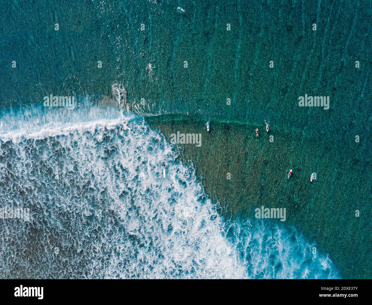 Surfers on sea waves, aerial view Stock Photo - Alamy