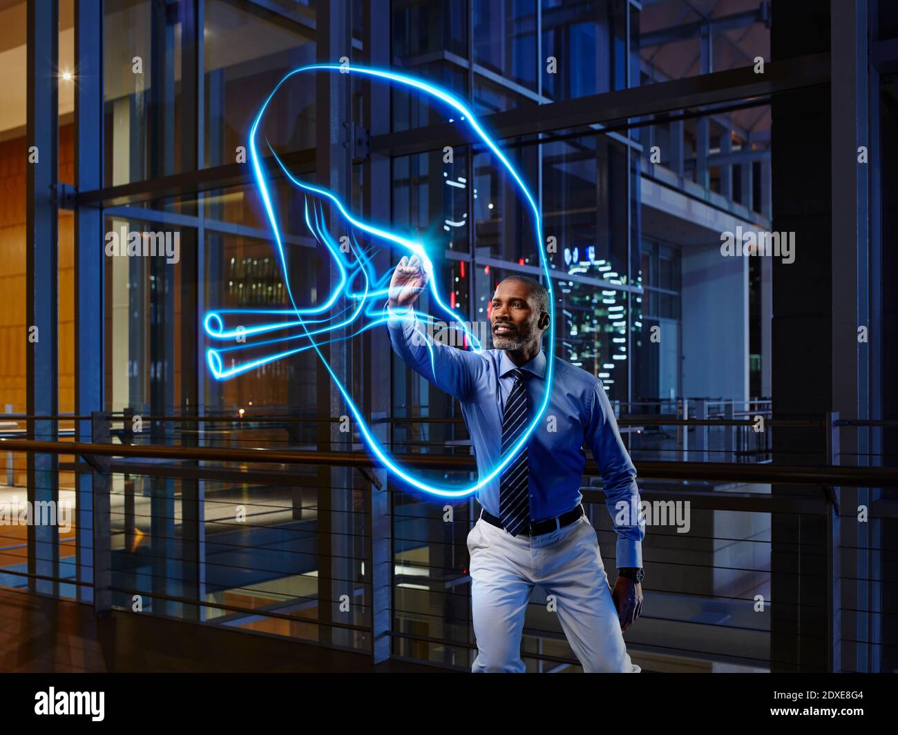 Male internist light painting spleen in laboratory at hospital Stock ...