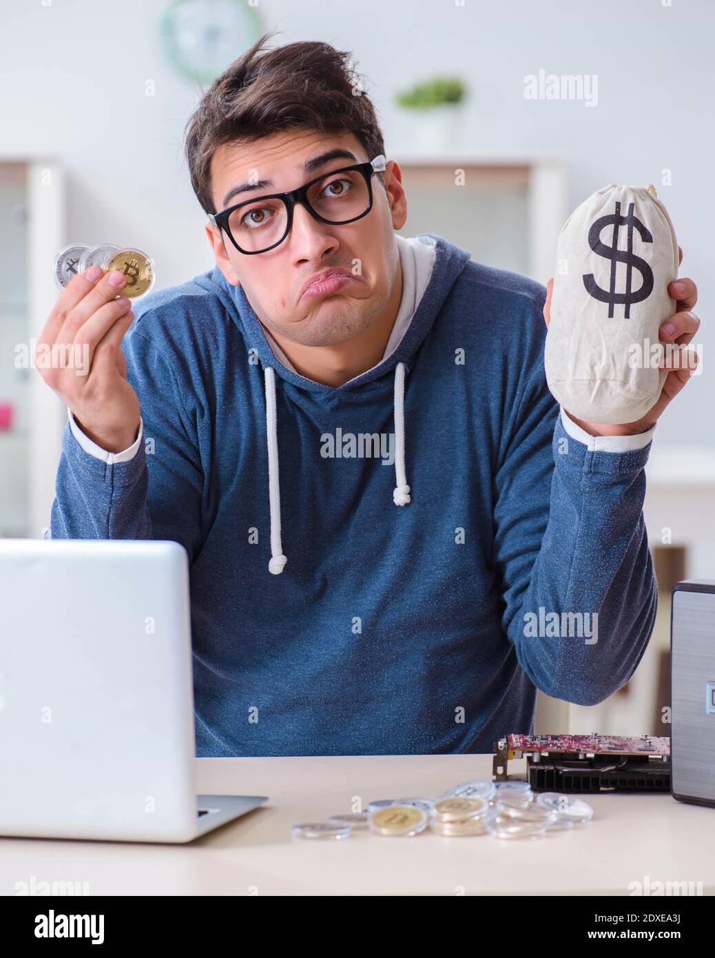 Young businessman bitcoin money bag hi-res stock photography and images ...