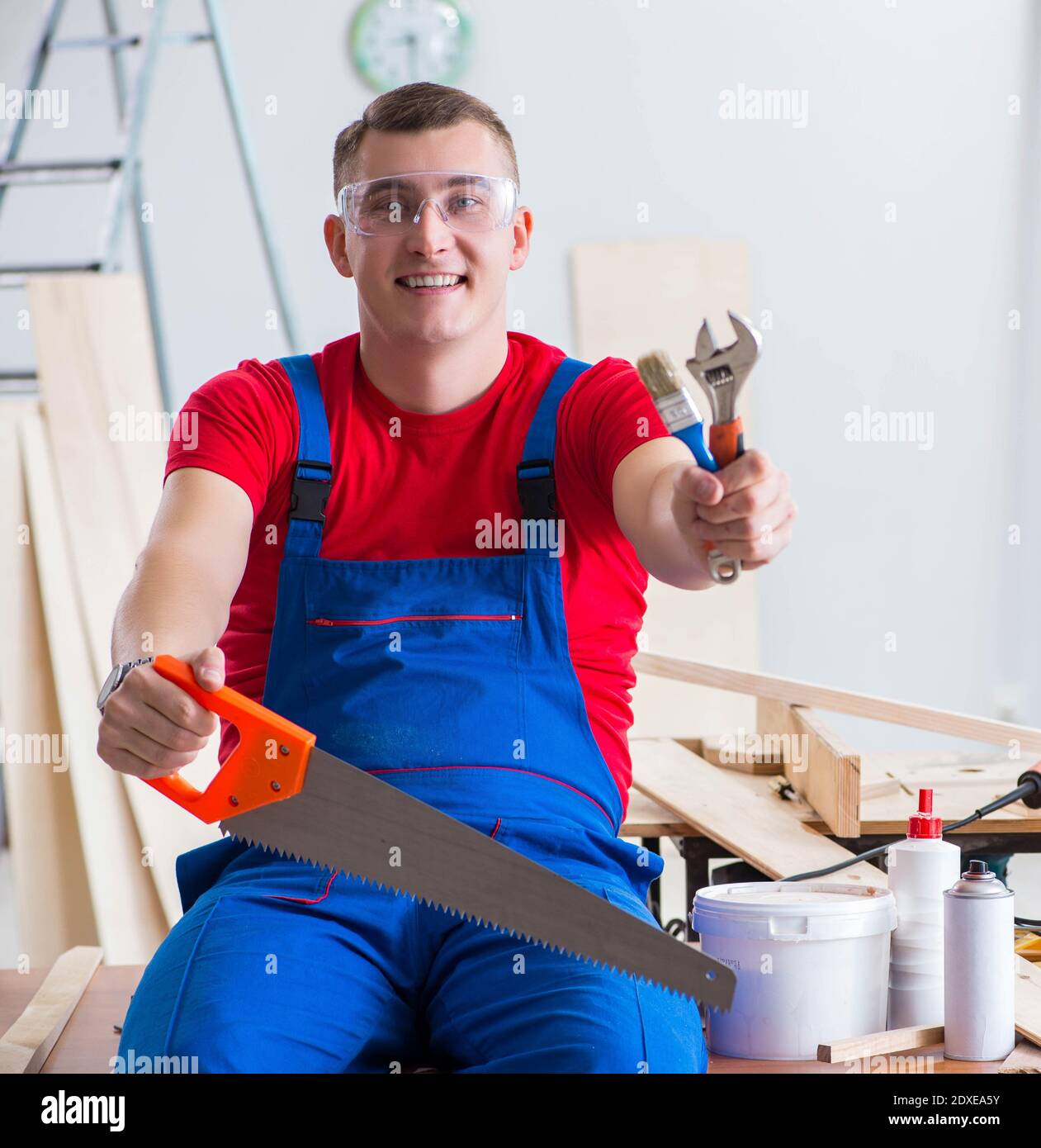 The contractor working in the workshop Stock Photo - Alamy