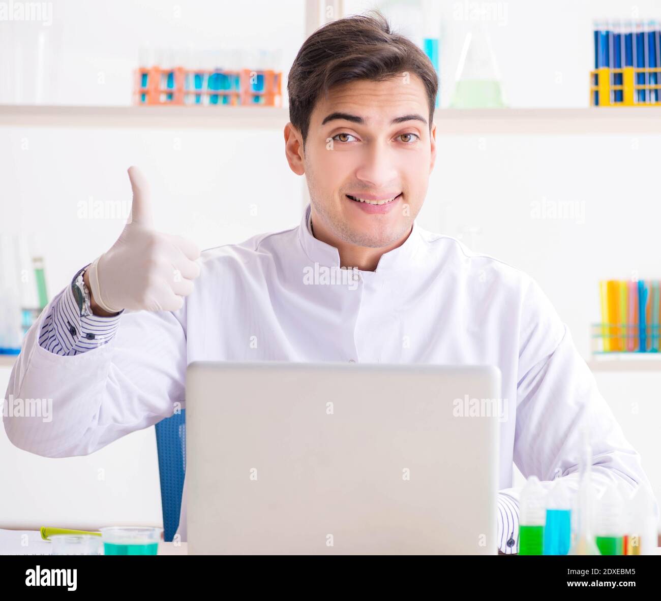 The man student working in chemical lab on experiment Stock Photo - Alamy