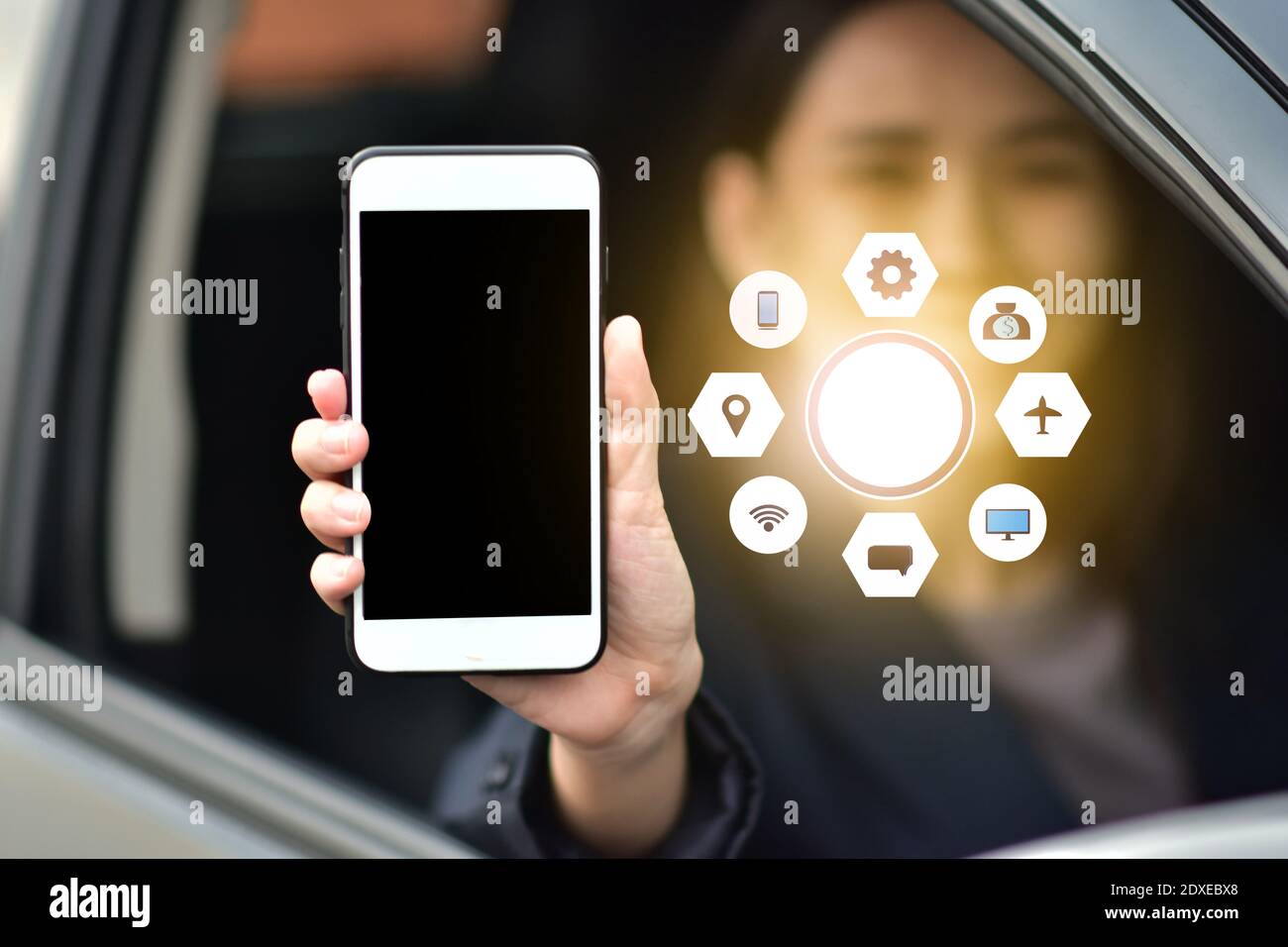 People sitting in car using mobile smart phone application social media ...