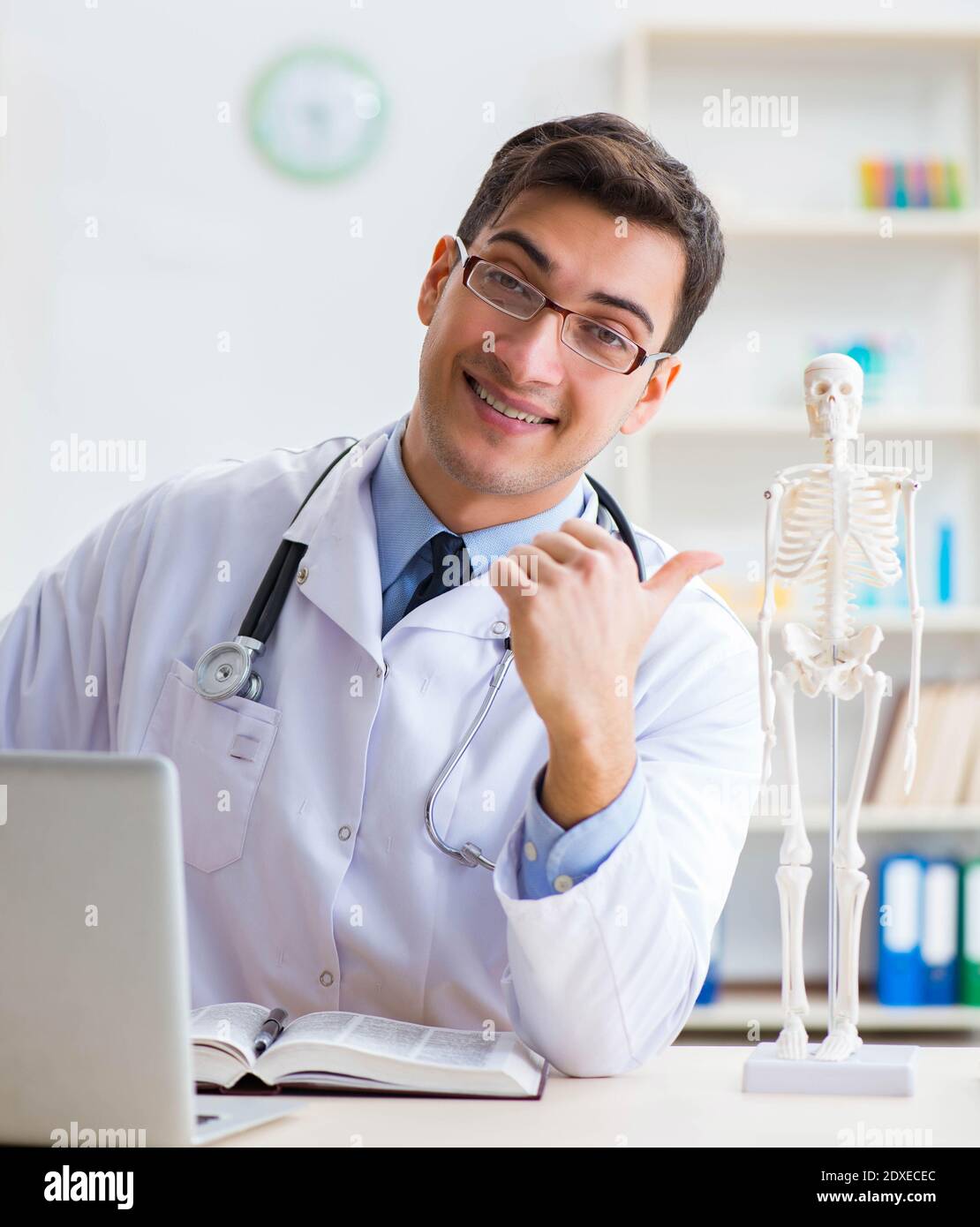 The doctor student studying the bones of skeleton Stock Photo - Alamy
