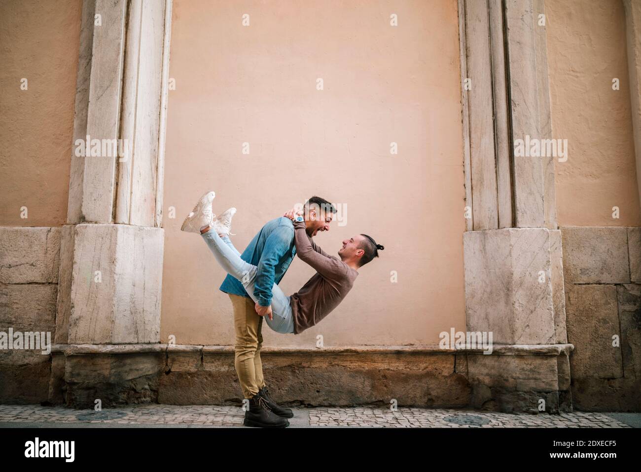 Gay man carrying man hi-res stock photography and images - Alamy