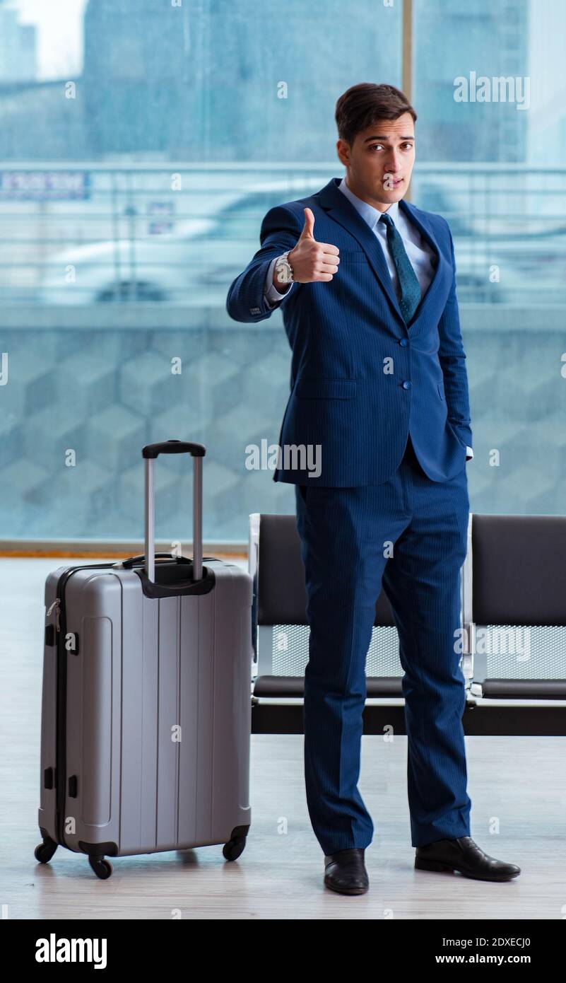 Businessman waiting at the airport for his plane in business class Stock Photo - Alamy