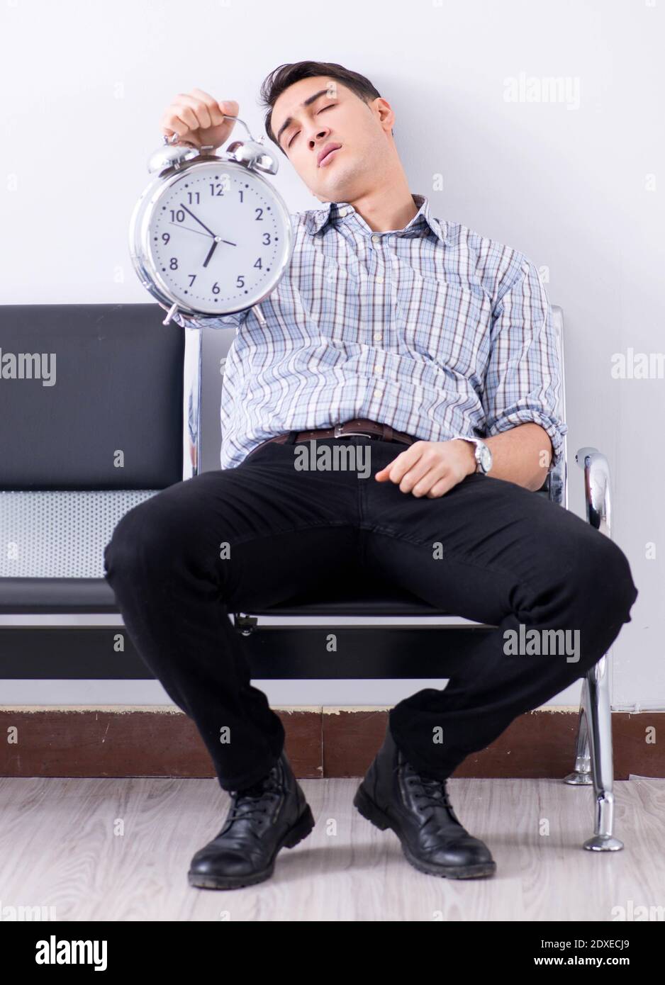 The man nervously impatiently waiting in the lobby Stock Photo - Alamy
