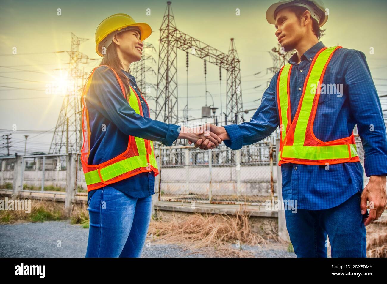 Business women Hands Shake Businessman,Engineer Shake hand at Power ...