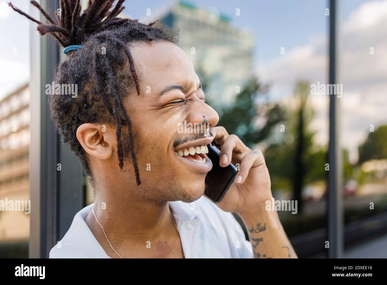 Man standing using phone hi-res stock photography and images - Alamy