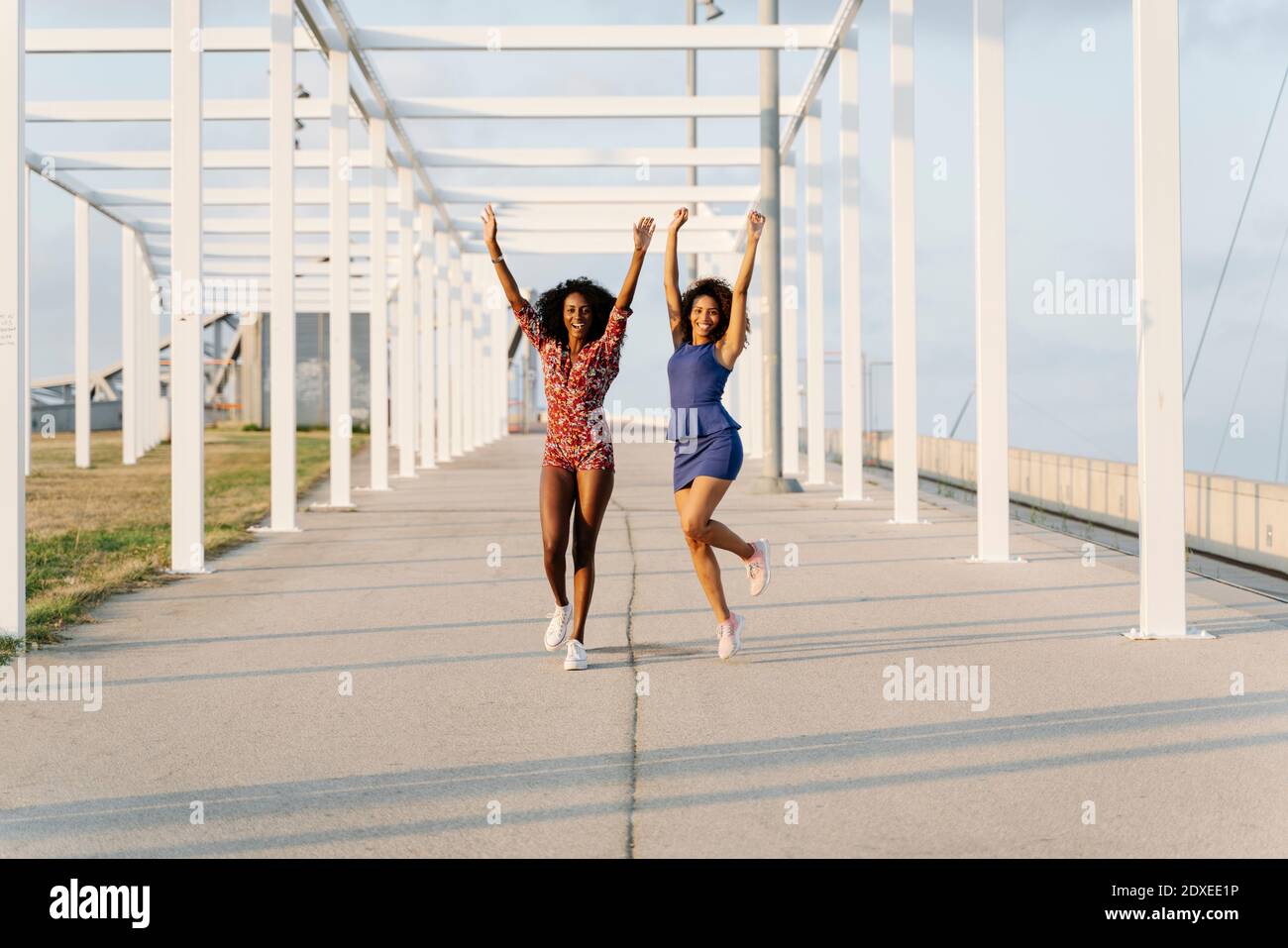 Excited female friends hi-res stock photography and images - Alamy