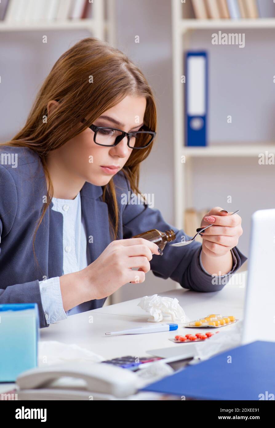 The businesswoman employee sick in the office Stock Photo - Alamy