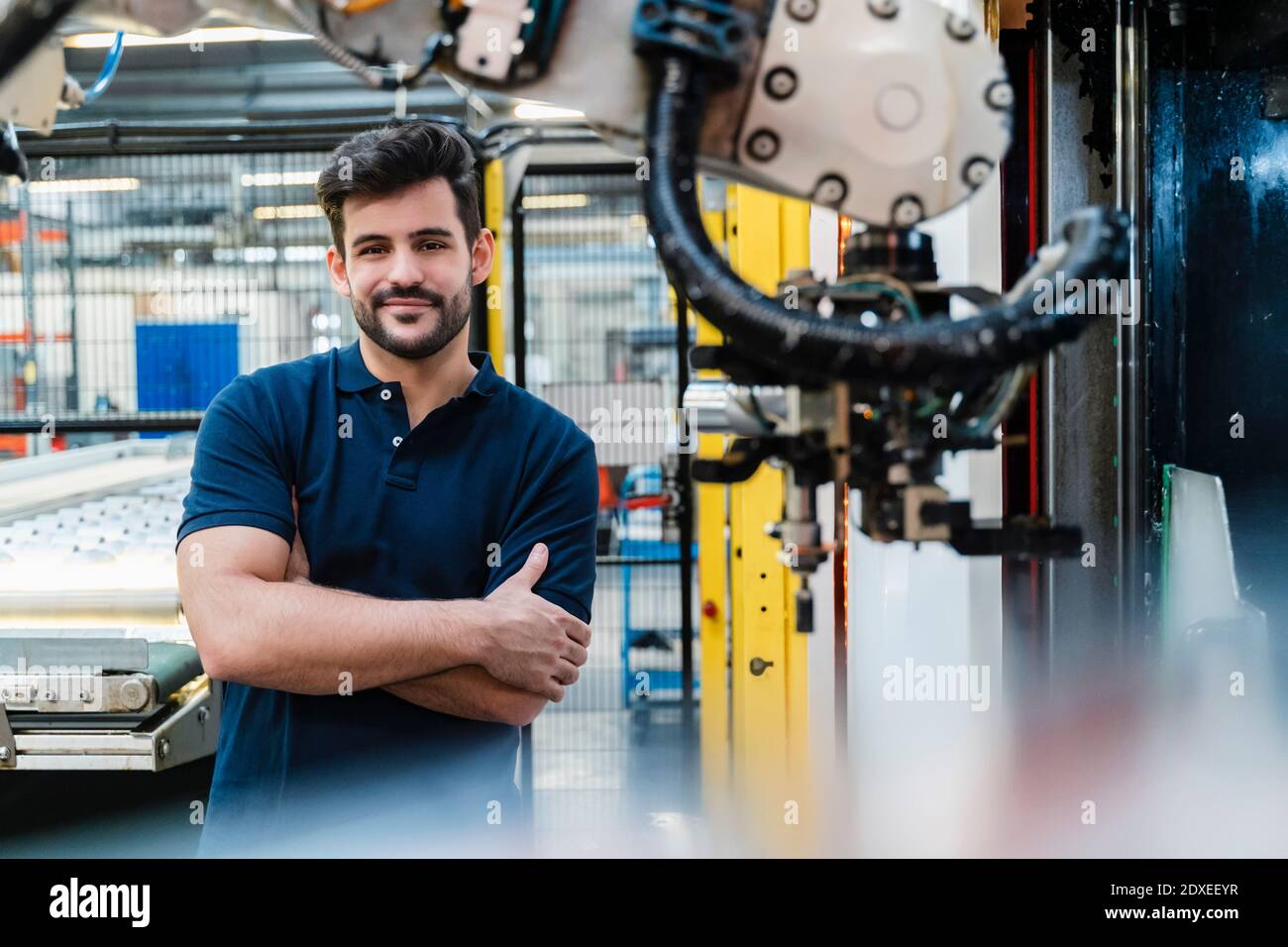 Smiling male worker hi-res stock photography and images - Alamy