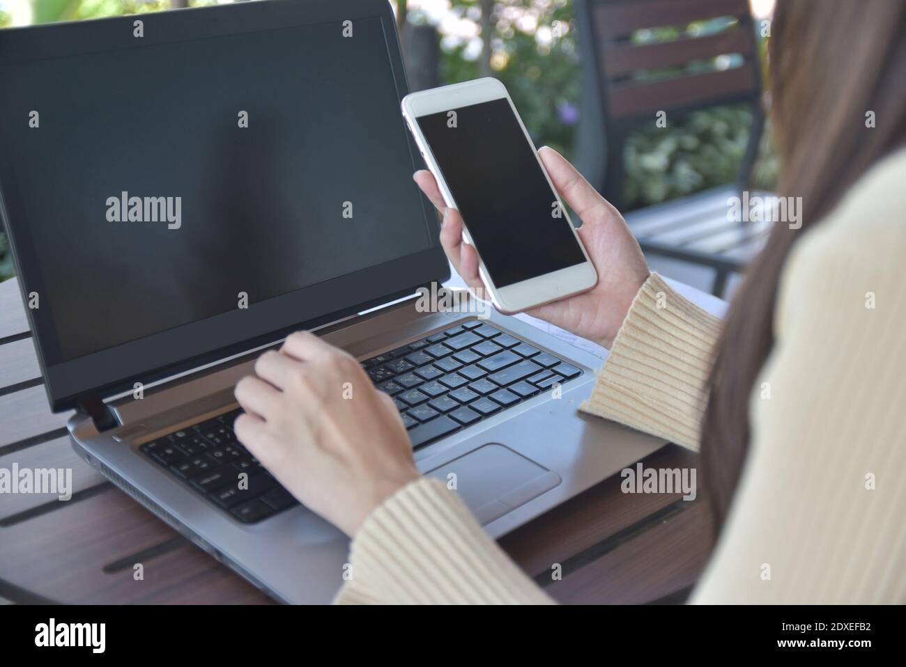 Women using cell phone and Computer notebook by internet social network ...