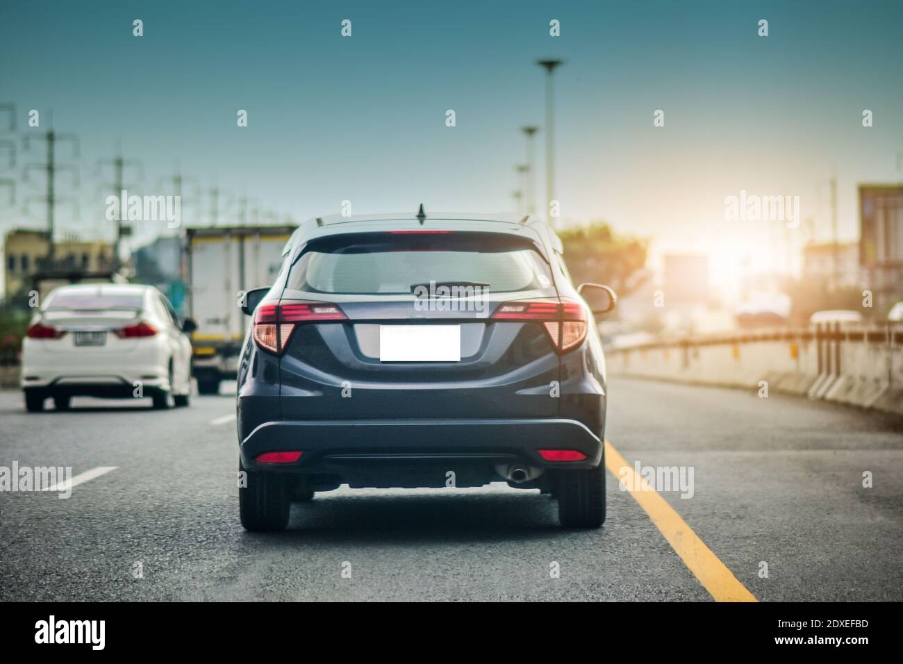 Car Driving on road and Small passenger car seat on the road used for ...