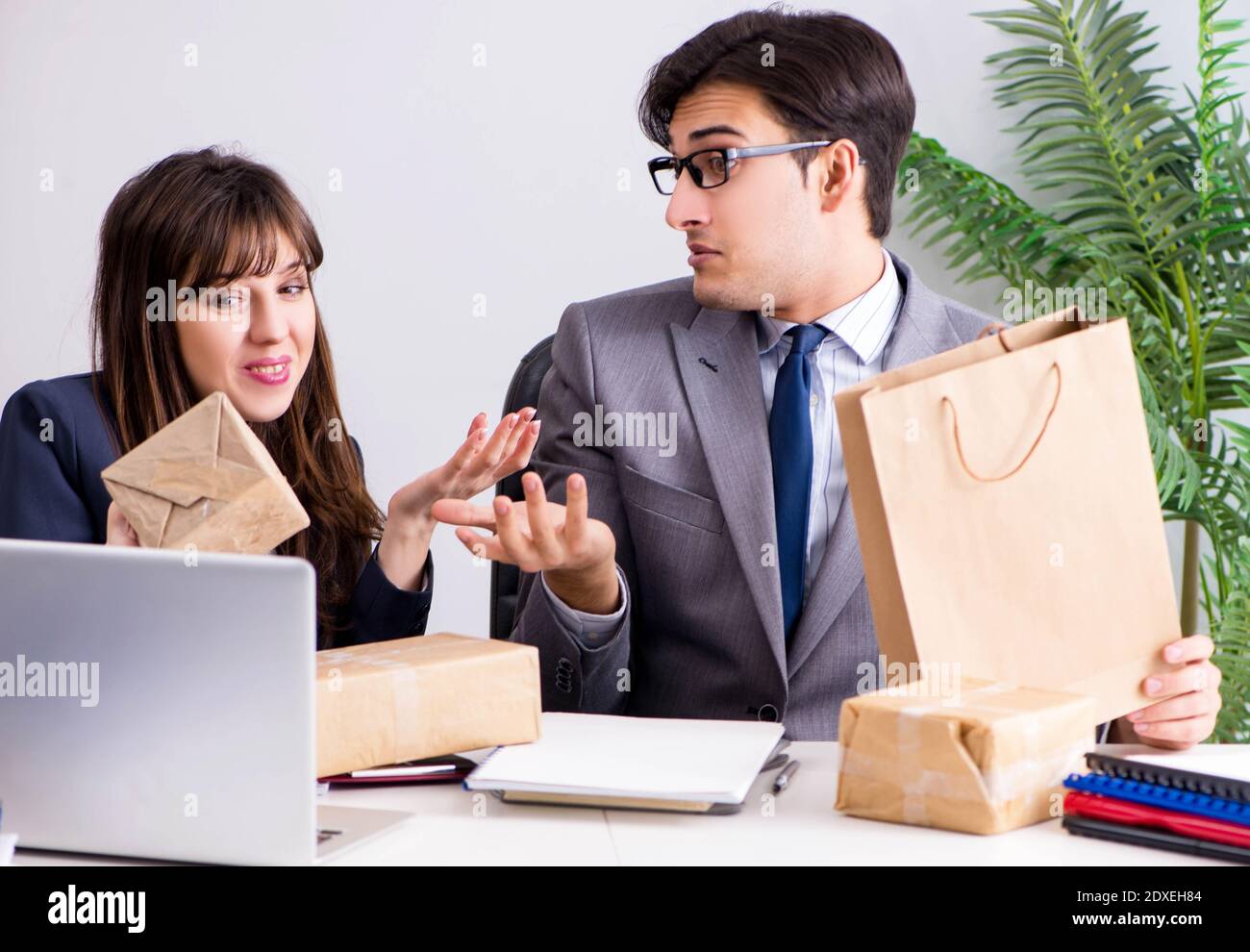 The business people receiving new mail and parcels Stock Photo - Alamy