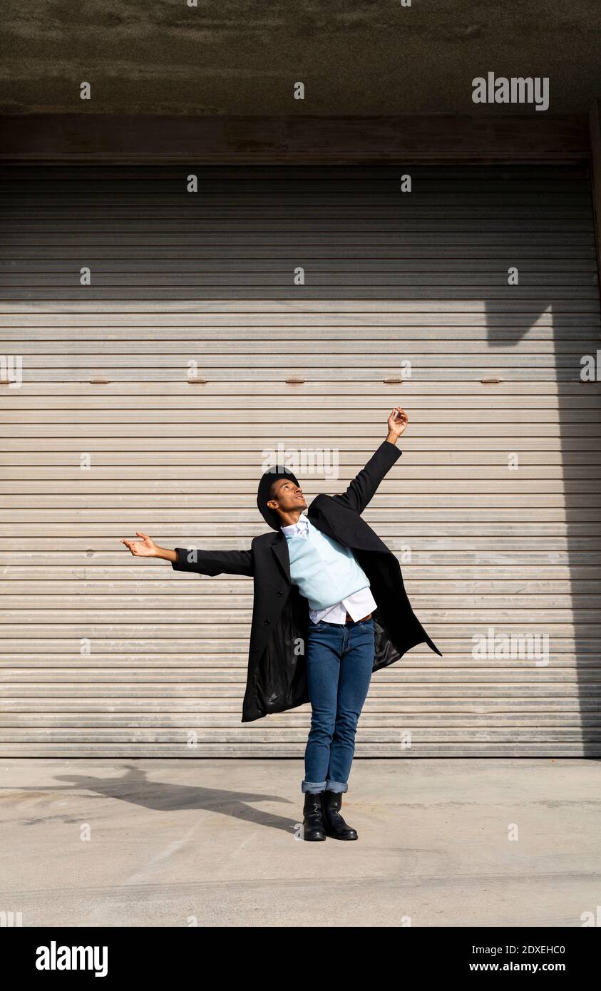 Carefree man dancing arms hi-res stock photography and images - Alamy