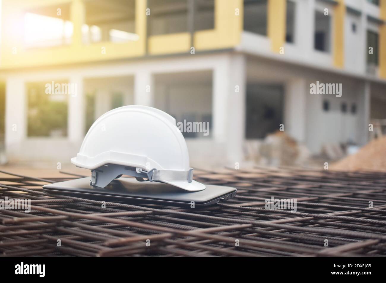 White helmet hard hat safety building estate construction background ...