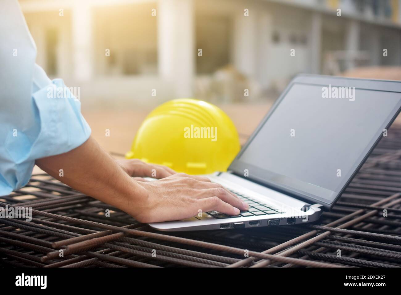 Engineering use computer at work building construction background Stock ...