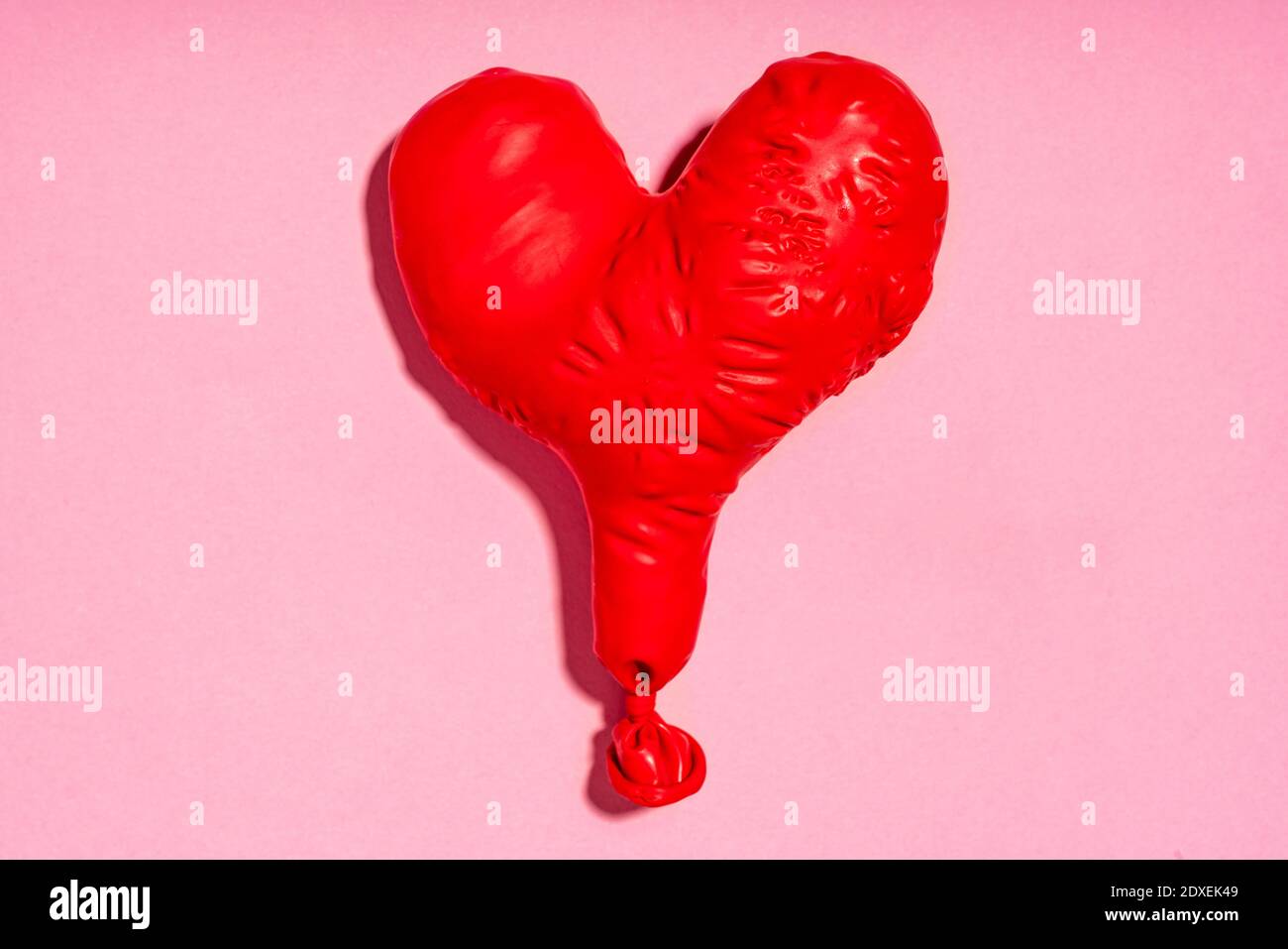 Heart red deflated balloon hi-res stock photography and images - Alamy