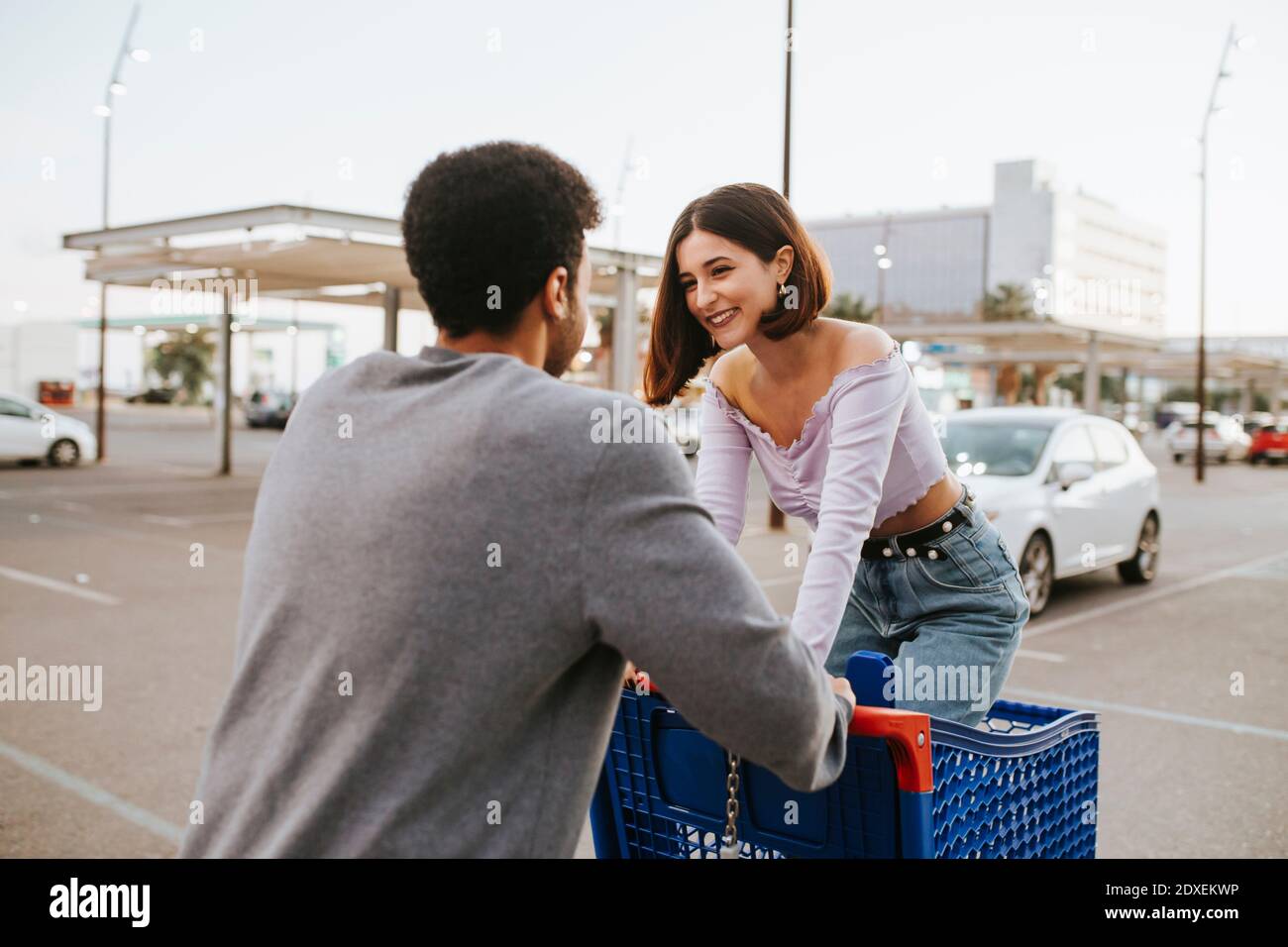 Man pushing cart sunset hi-res stock photography and images - Alamy