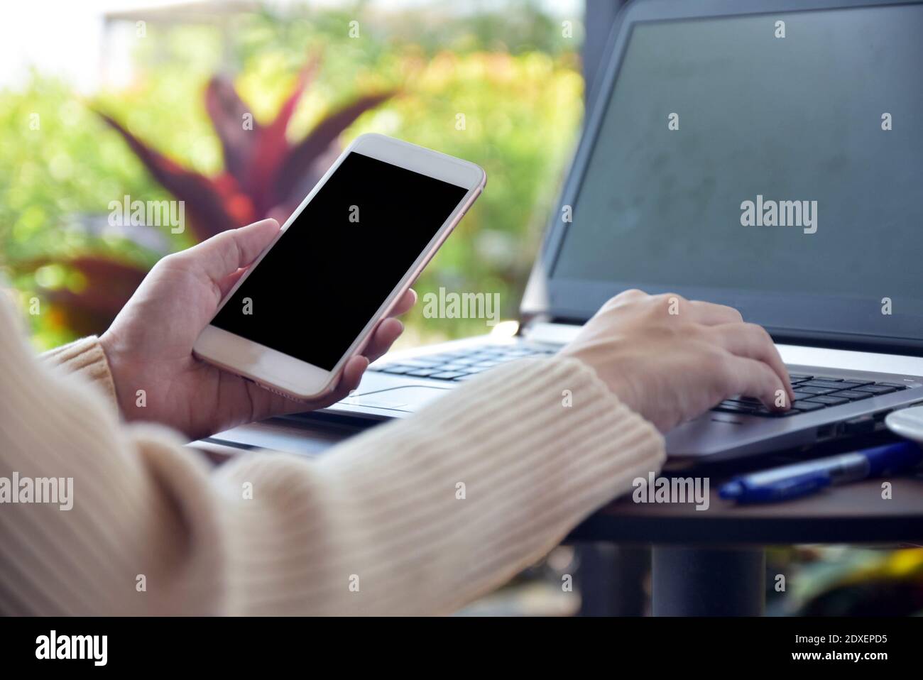 People holding mobile smart phone looking on screen and working ...