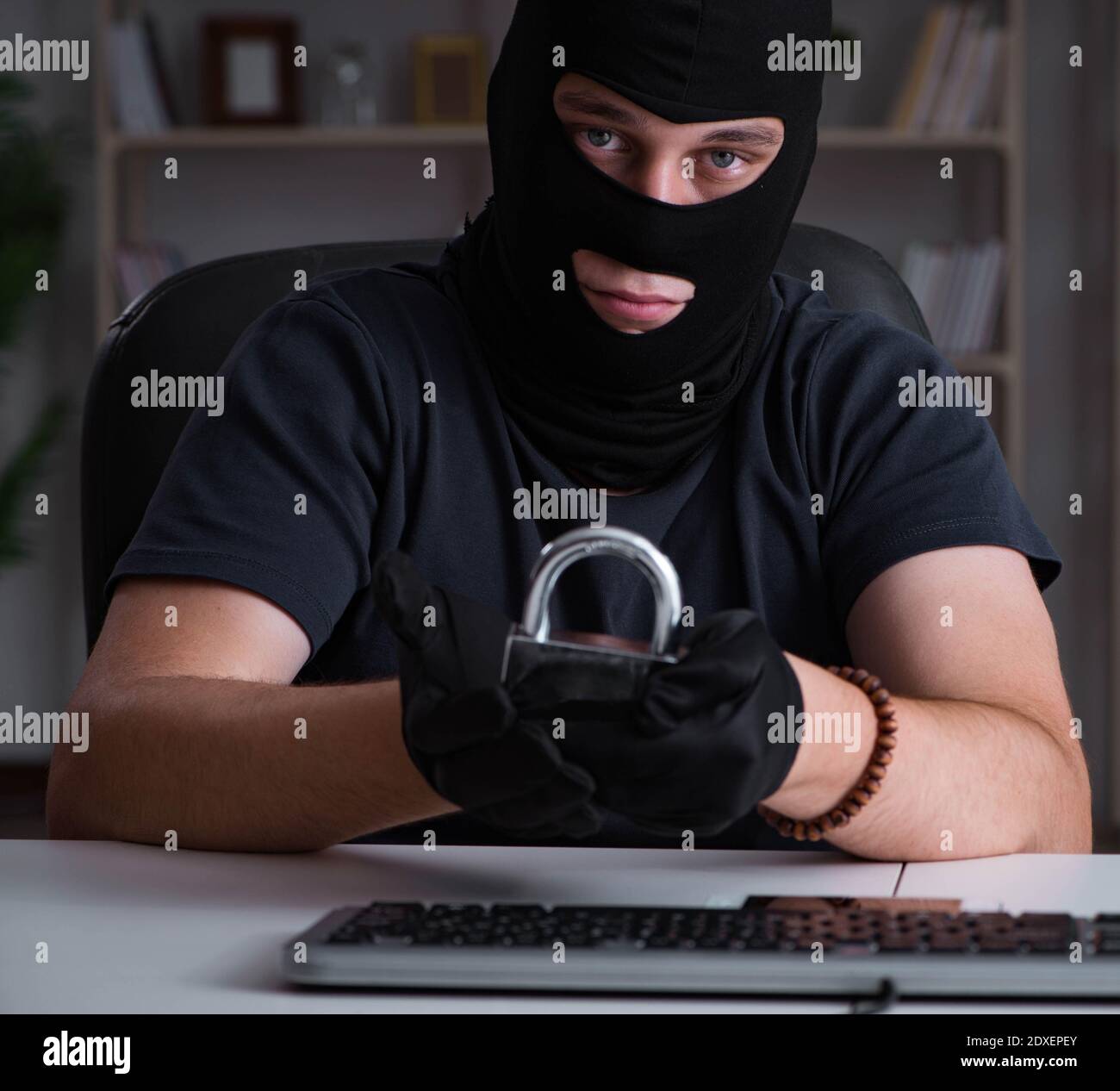 The hacker hacking computer late at night Stock Photo - Alamy