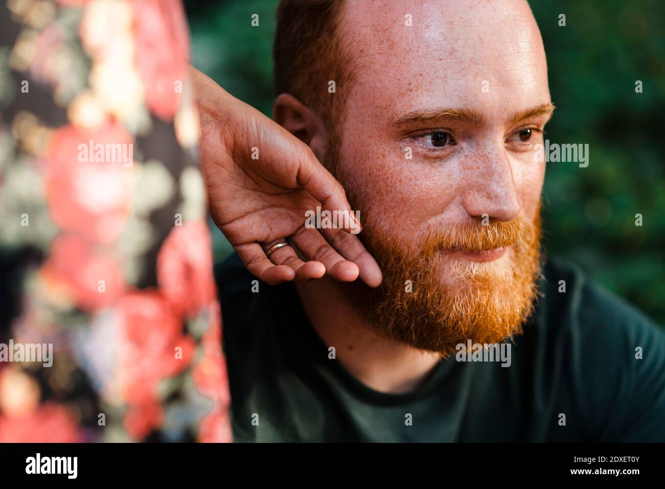 Woman touching boyfriend face with hand hi-res stock photography and ...