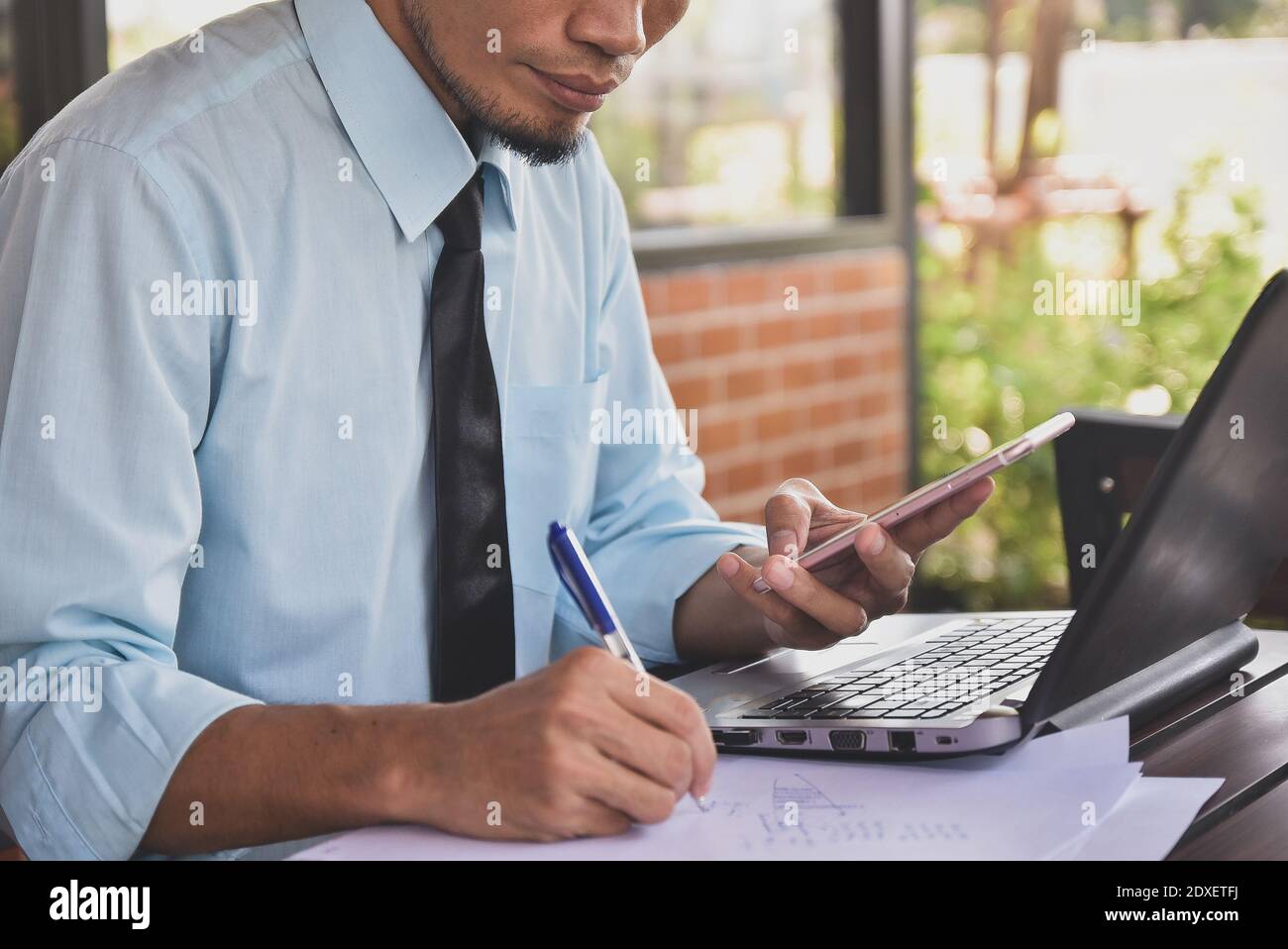 Close up hand sign document write on paper sign contract business work ...