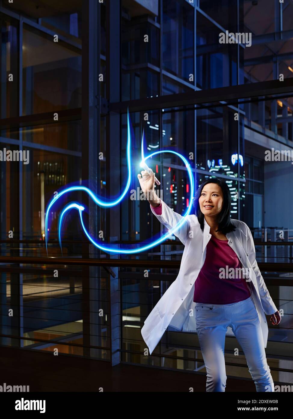Female gastroenterologist examining esophagus in laboratory at hospital ...