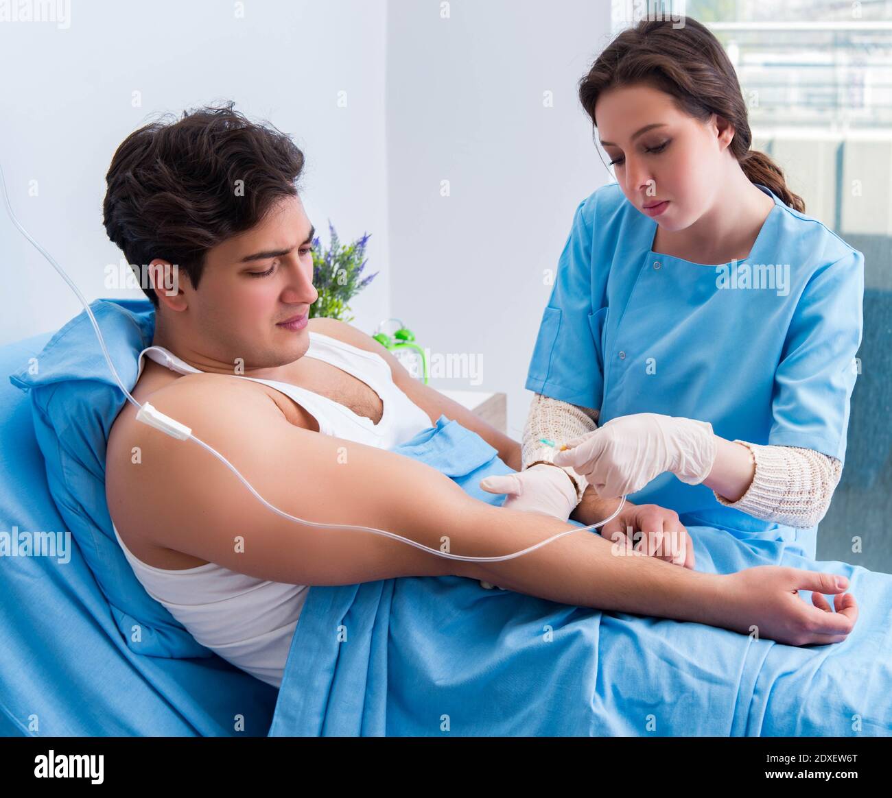 Doctor doing medical insulin injection hi-res stock photography and ...