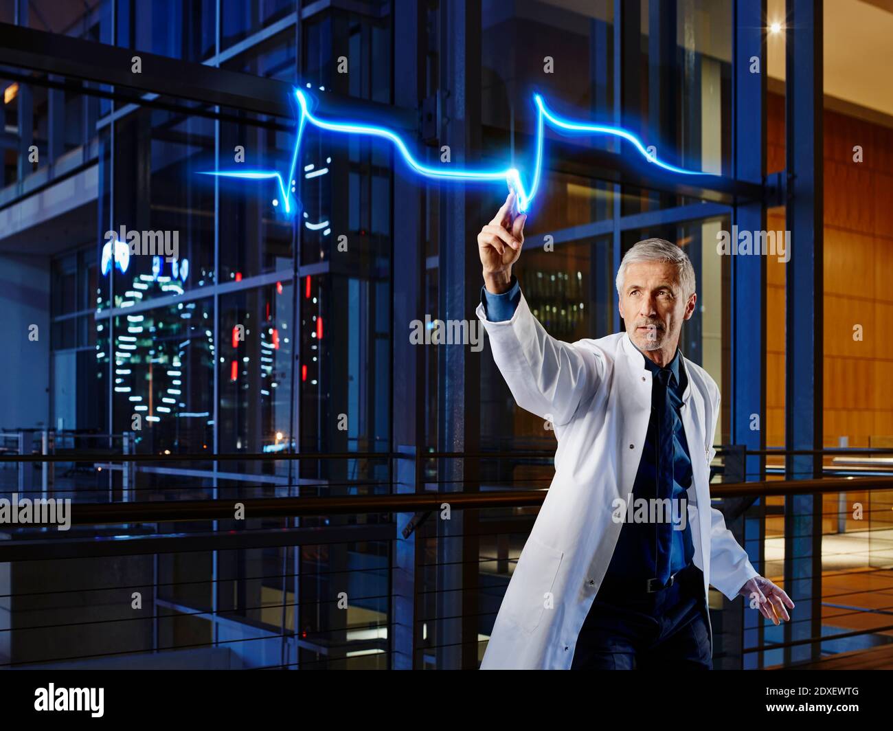 Male cardiologist examining heart attack in laboratory Stock Photo - Alamy