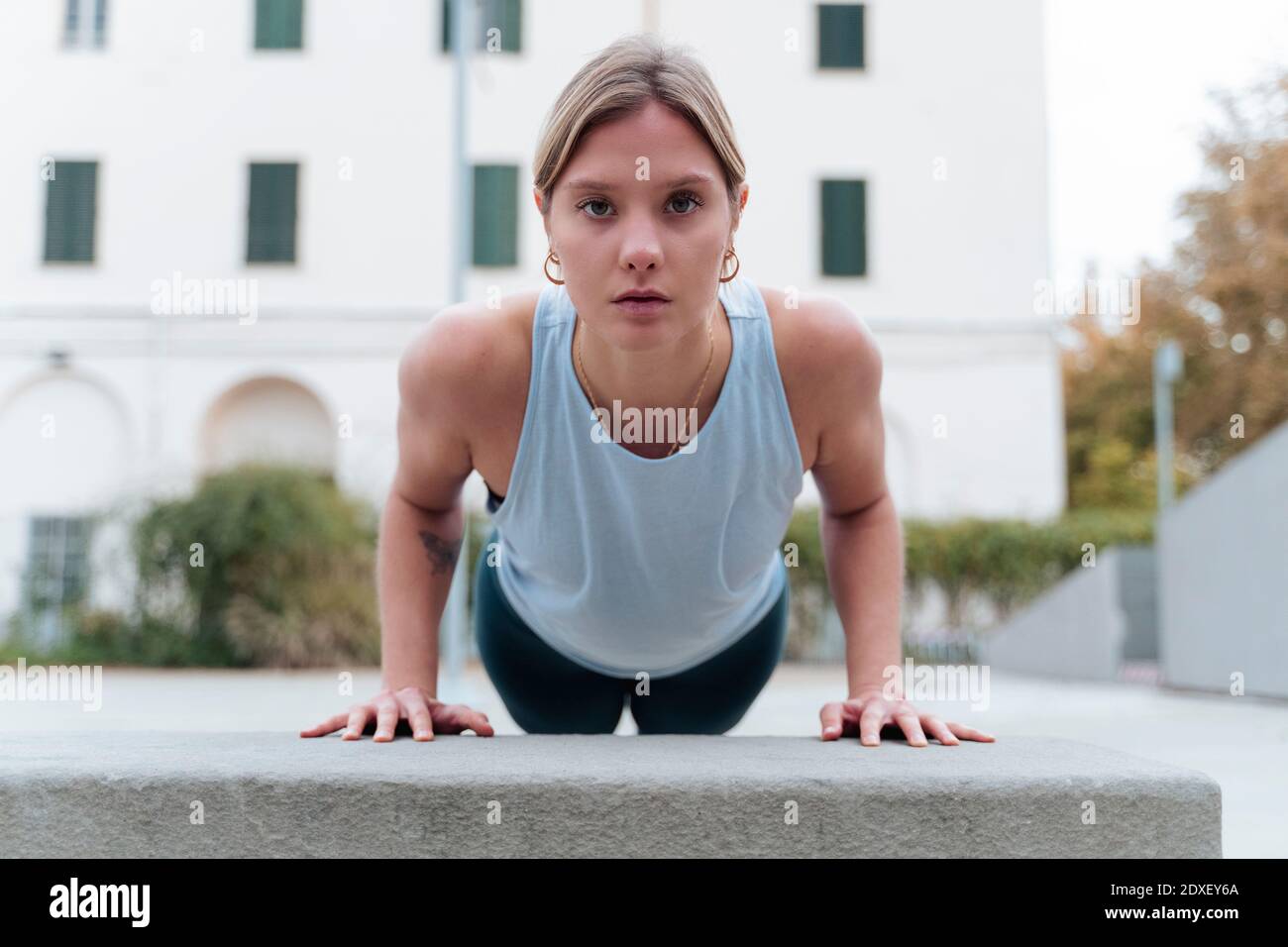 Young woman doing muscle hi-res stock photography and images - Alamy