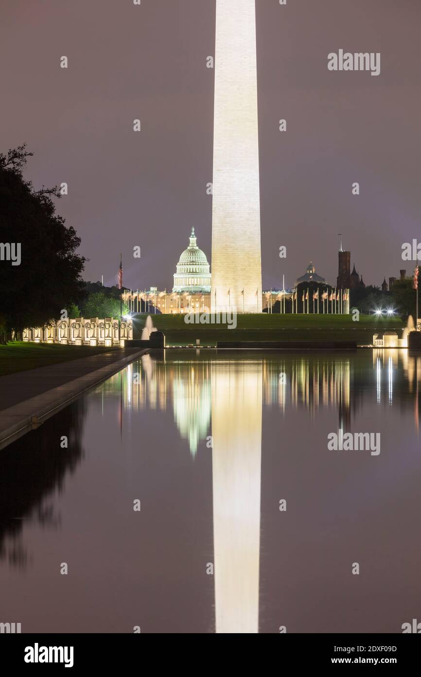 USA, Washington DC, Washington Monument reflecting in Lincoln Memorial ...