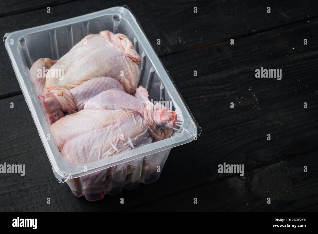 Whole raw chicken meat package with copy space for text Stock Photo - Alamy