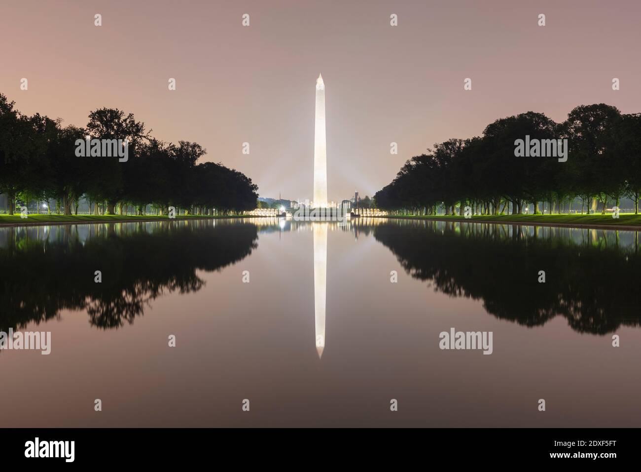 USA, Washington DC, Washington Monument reflecting in Lincoln Memorial ...