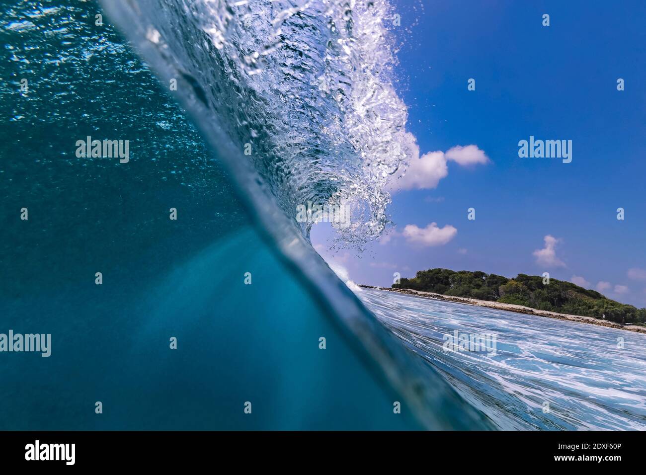 Blue splashing wave of Arabian Sea Stock Photo - Alamy