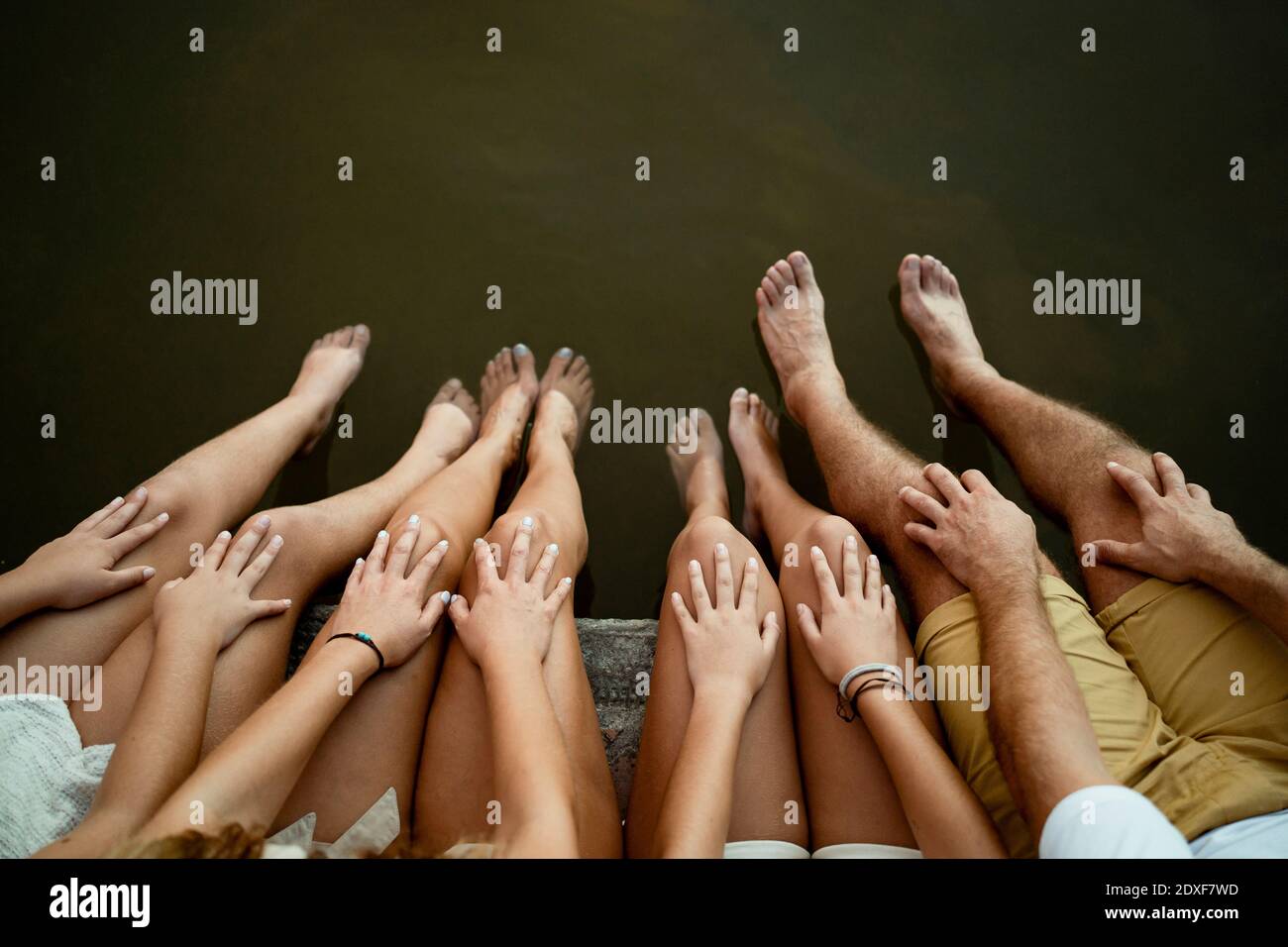Girl legs dangling hi-res stock photography and images - Alamy