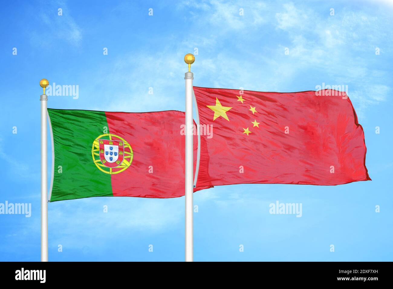 Portugal and China two flags on flagpoles and blue sky Stock Photo - Alamy