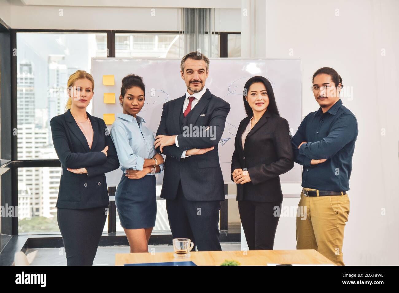 Business team standing in office meeting room success project Stock ...