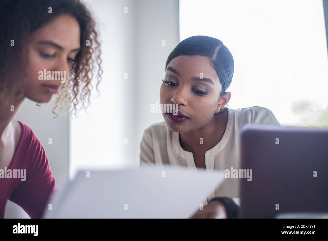 Businesswomen brainstorming during meeting in office Stock Photo - Alamy Businesswomen brainstorming during meeting in office Stock Photo - Alamy