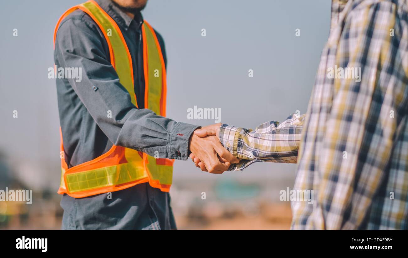Engineering Shake hand success project teamwork road construction ...