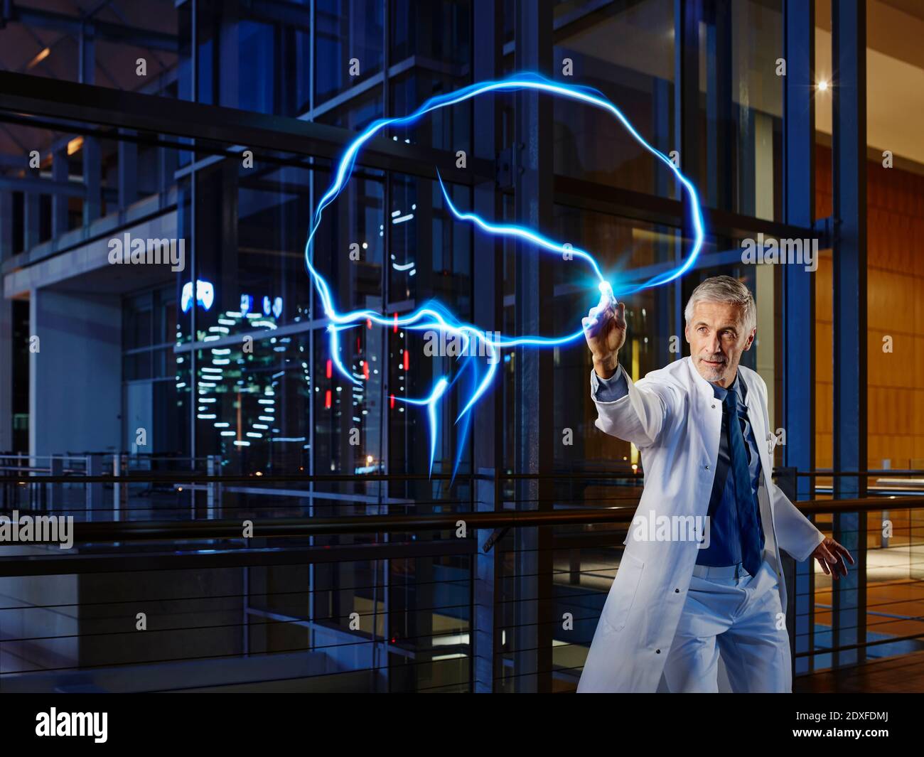 Male neurologist examining brain at laboratory in hospital Stock Photo ...