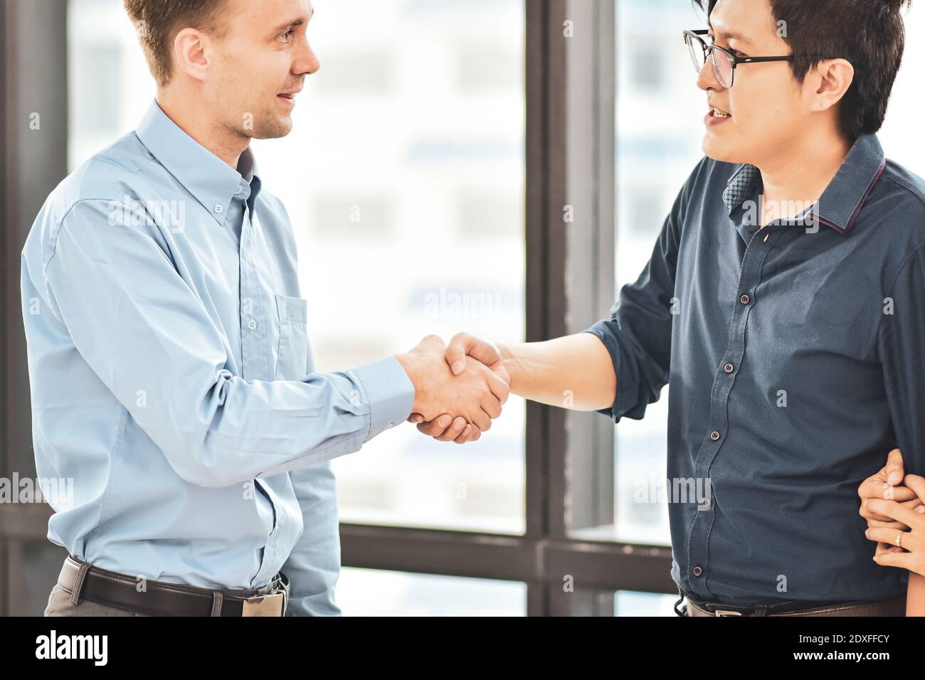 Sales man shake hands to customer successful to sale home Stock Photo ...