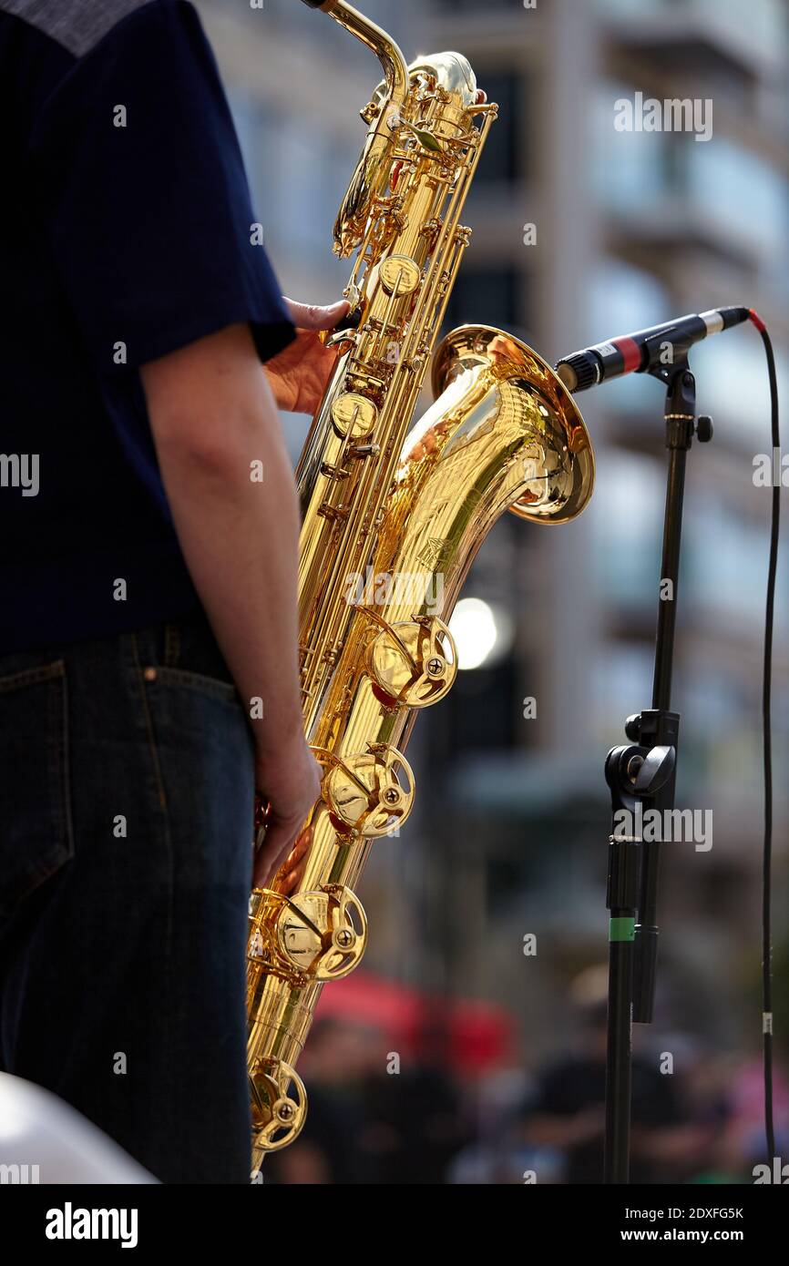Man playing bass saxophone hi-res stock photography and images - Alamy