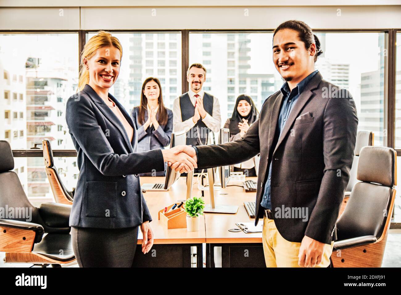 Business people shake hands success project in meeting room with ...