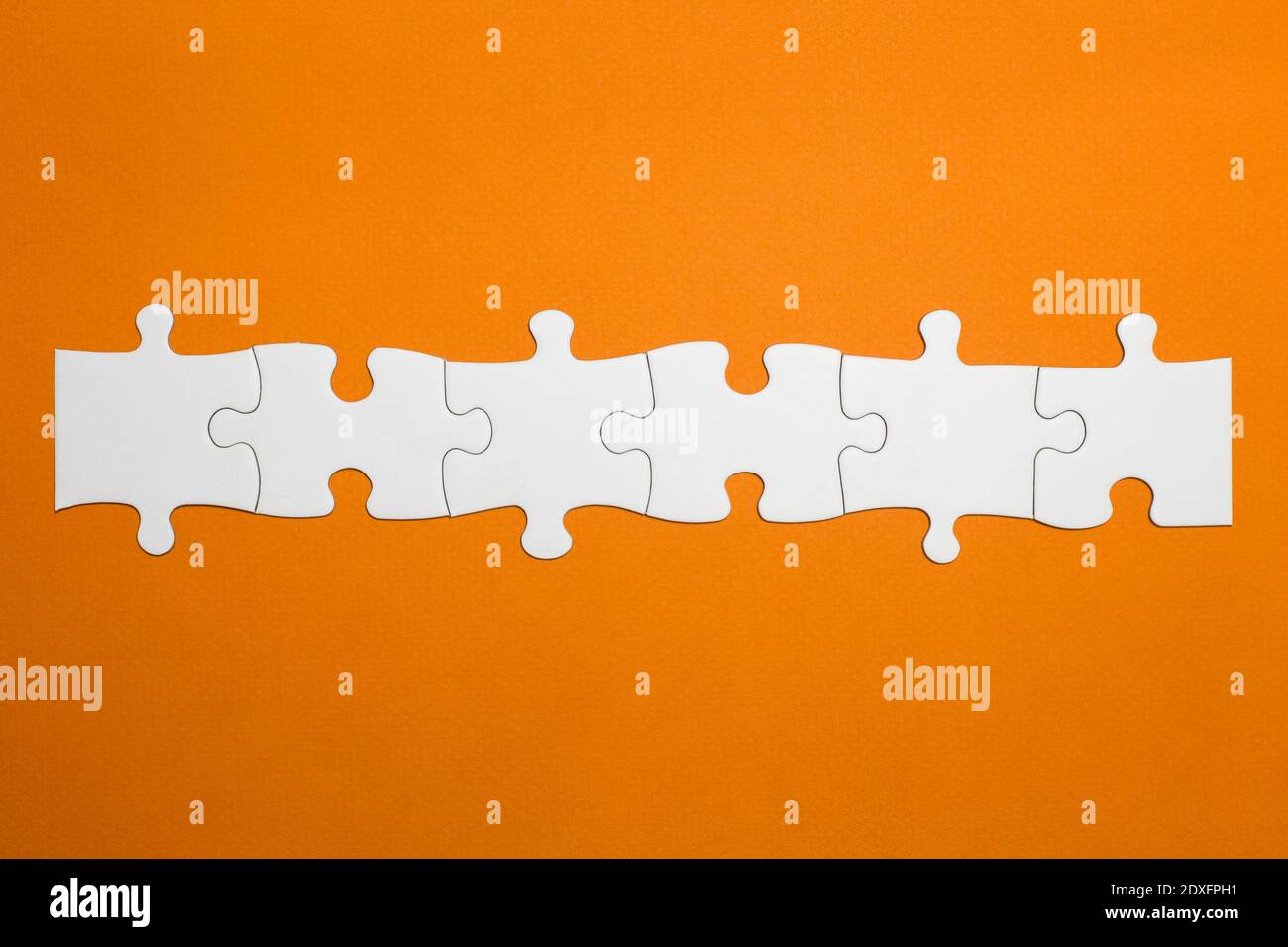 A 6 puzzle pieces joined together to form words or concepts that ...